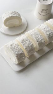 Coconut Swiss Cake Roll - Cafe Deluxe