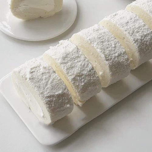 Coconut Swiss Cake Roll - Cafe Deluxe